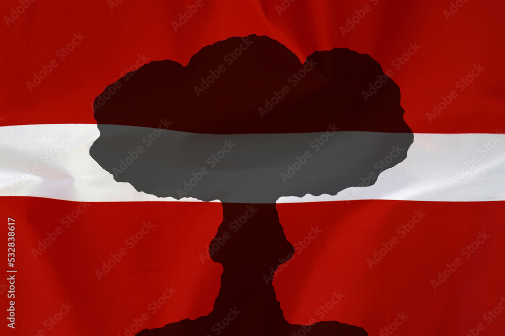 Atomic bomb explosion mushroom on Latvia flag background. Nuclear ...