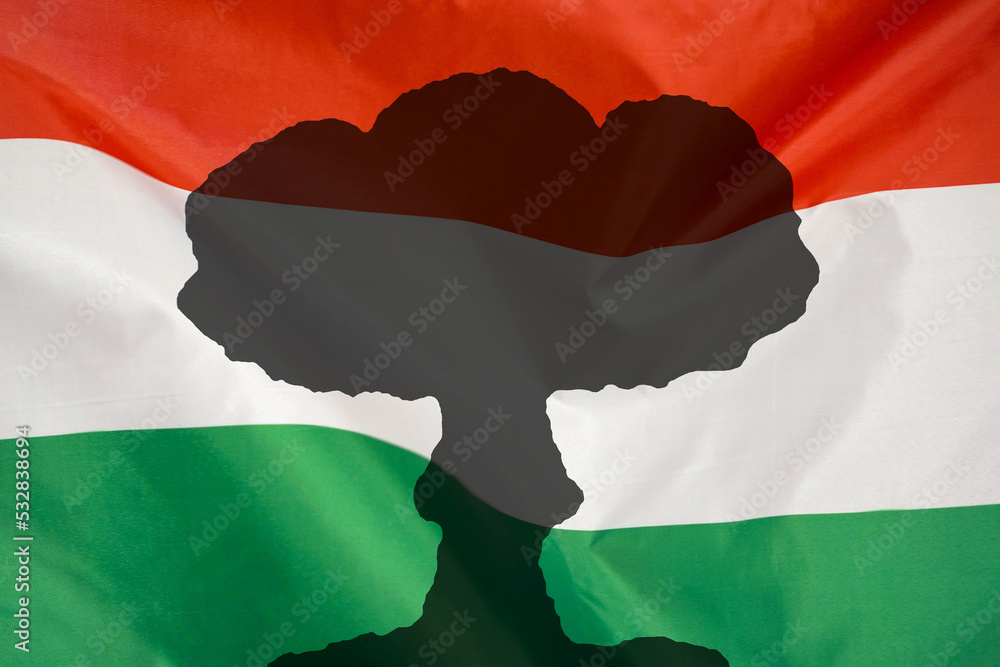 Atomic bomb explosion mushroom on Hungary flag background. Nuclear ...