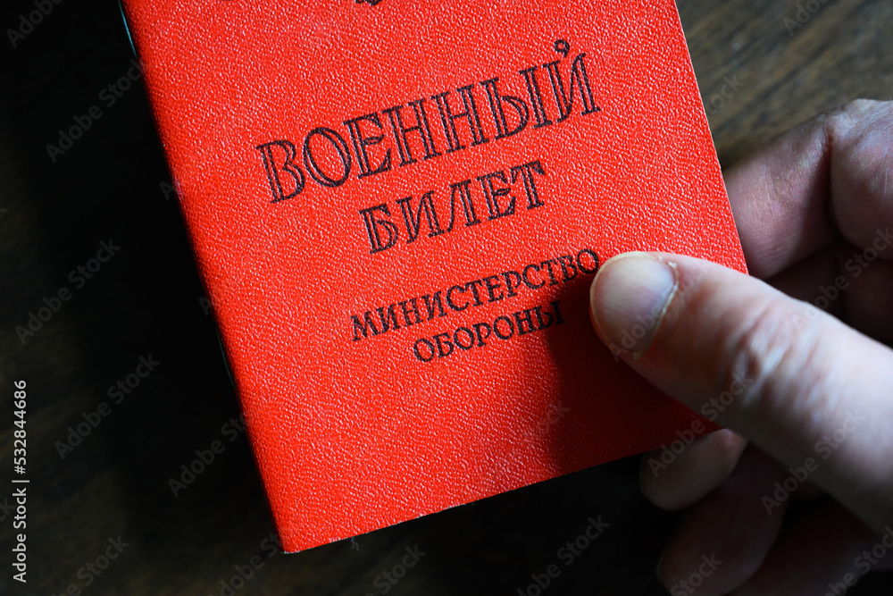 Certificate of Russian serviceman, military ID in hand, top view Stock ...