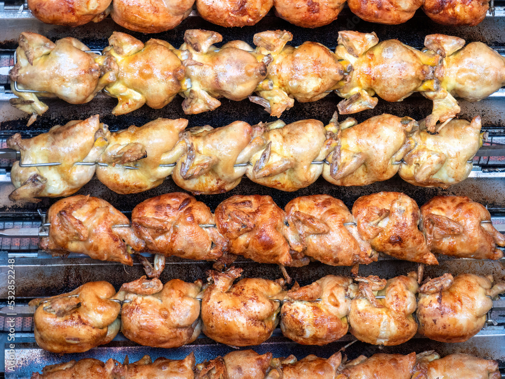 Really crispy chicken at the Oktoberfest 2022 rotary grill in Munich ...
