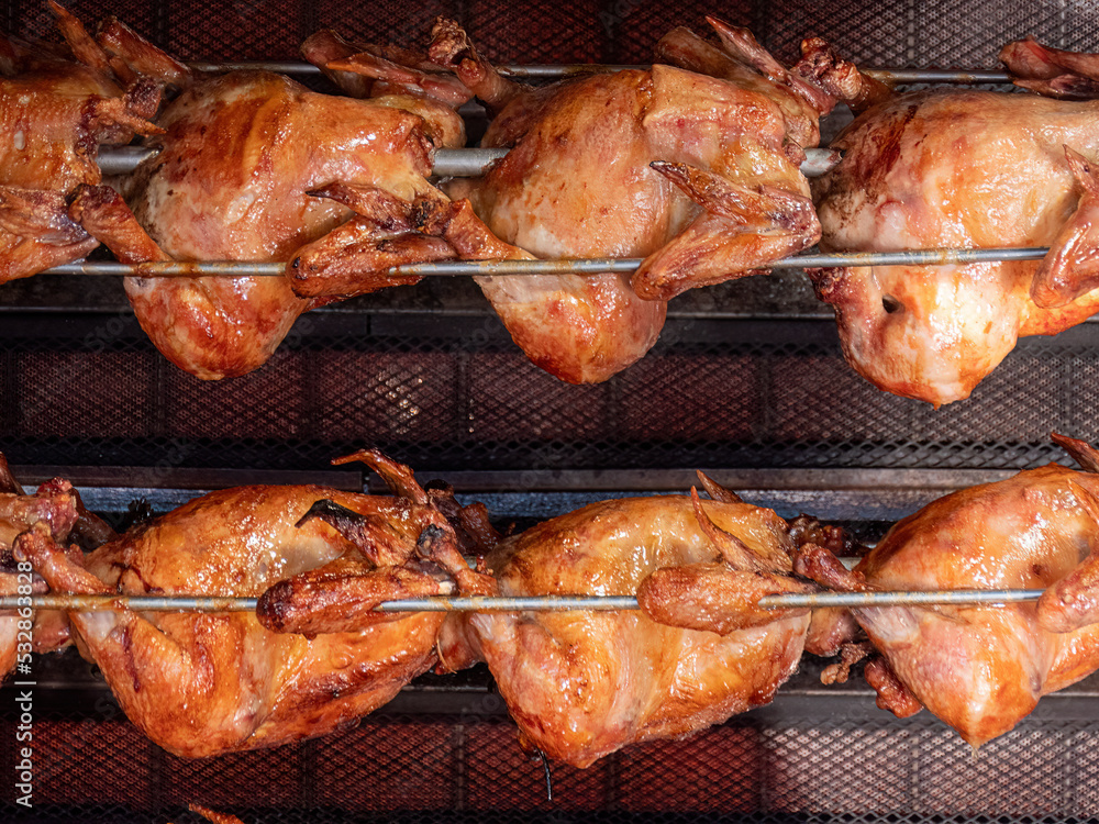 Really crispy chicken at the Oktoberfest 2022 rotary grill in Munich ...