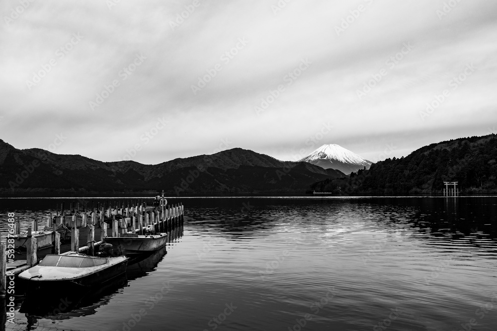 High contrast reflection of snow capped Mount Fuji in black and white ...
