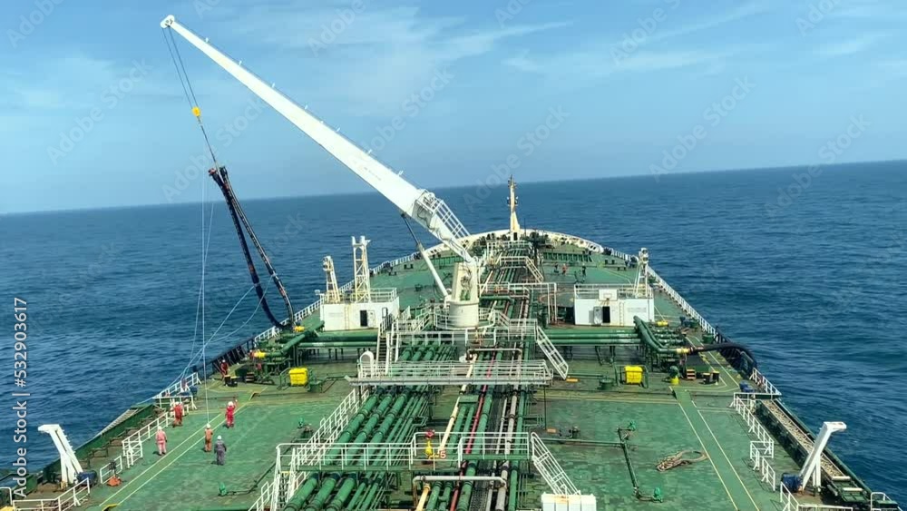 RIGGING AND TRANSFER OF CARGO HOSES IN OIL TANKER, FITTING OF CARGO ...