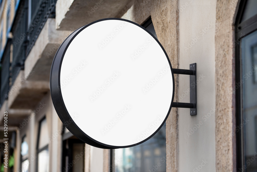 Mockup of a signboard hanging on a building Stock Photo | Adobe Stock