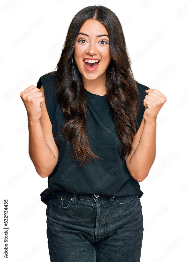 Beautiful brunette young woman wearing black shirt celebrating ...