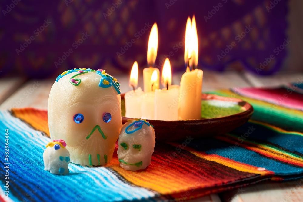 Sugar skulls or "calaveritas" in altar of the dead. Mexican tradition ...
