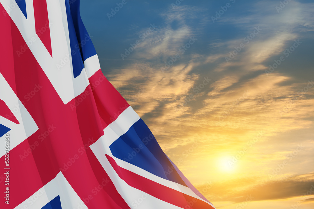 National flags of United Kingdom on sunset sky background. Background ...