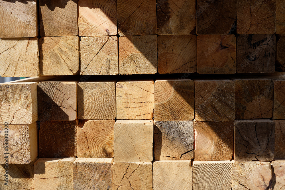 Wood texture.Stack of wood planks on lumber yard. lumber industrial ...