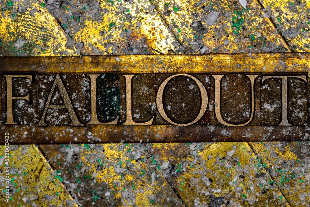 Fallout text with nuclear fallout on grunge textured copper and gold ...