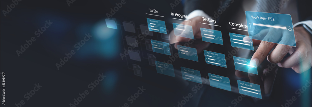 Agile software development. Business developer using computer with ... Agile software development. Business developer using computer with ...