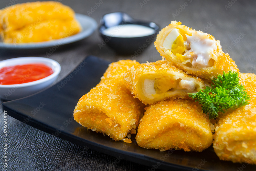 risol mayo or mayonnaise risole. food containing boiled eggs, sausage ...