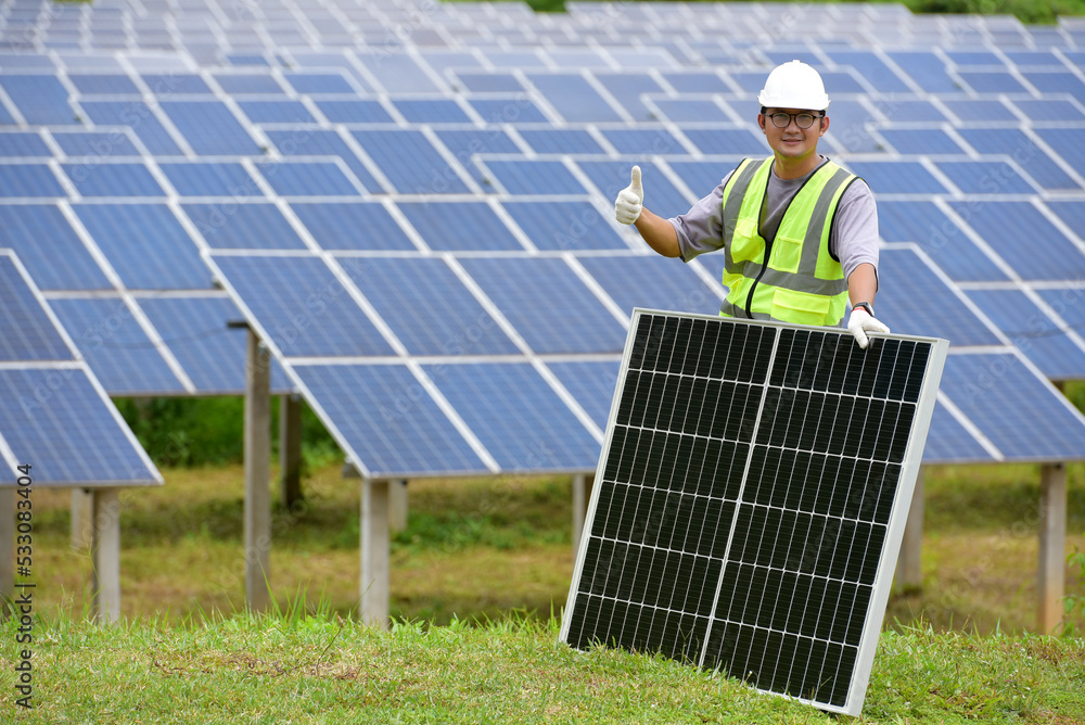 Solar Energy Engineer A team of male engineers is about to install ...