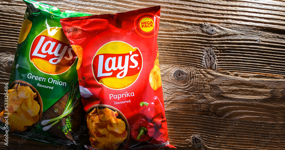 Composition with packets of Lays potato chips Stock Photo | Adobe Stock