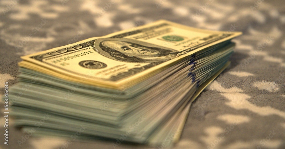 money in a book Stock Photo | Adobe Stock