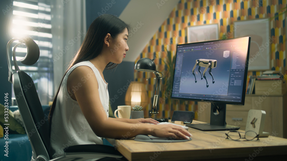 Asian woman working on pc in 3D modeling program remotely from home ...