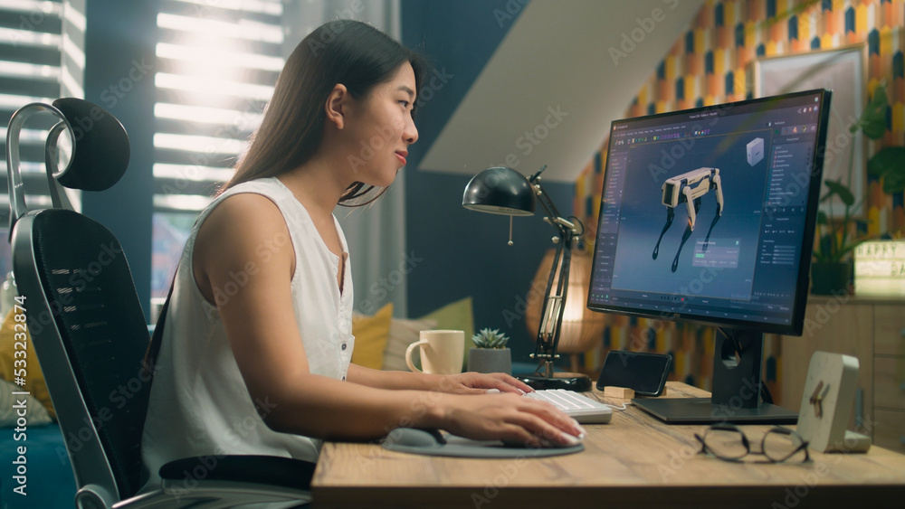 Asian woman working on pc in 3D modeling program remotely from home ...