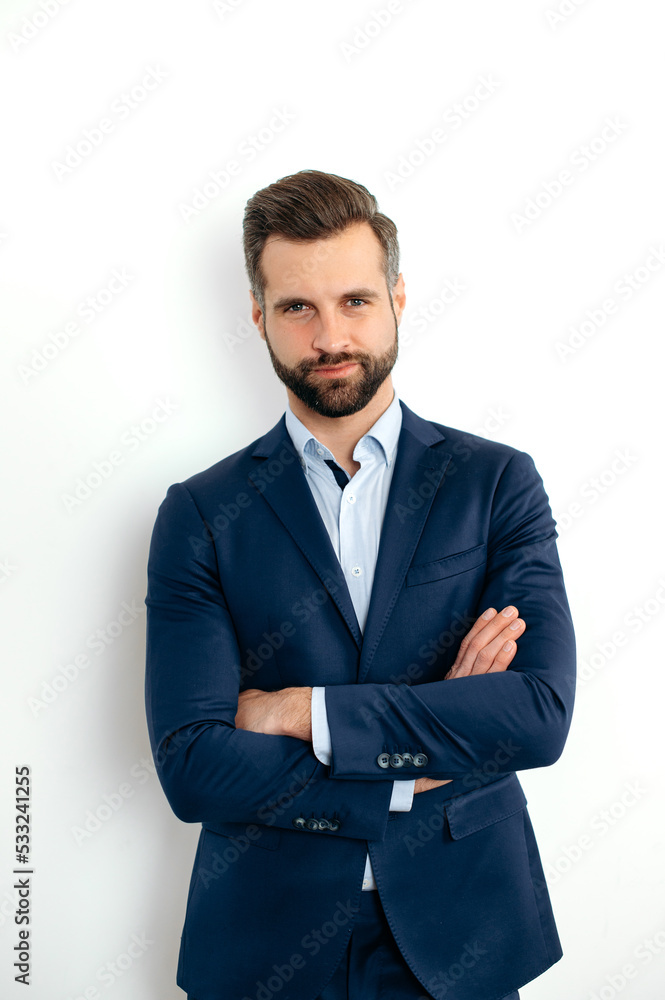 Vertical photo of a proud confident handsome bearded caucasian ...