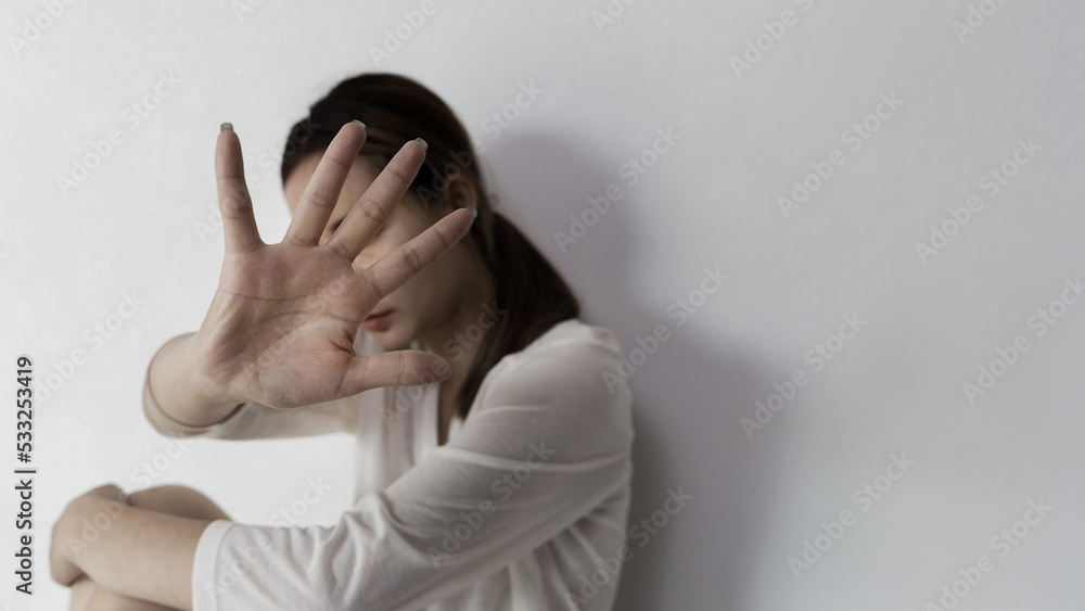 Stop hurting woman! young female person raised her hand for stop ...