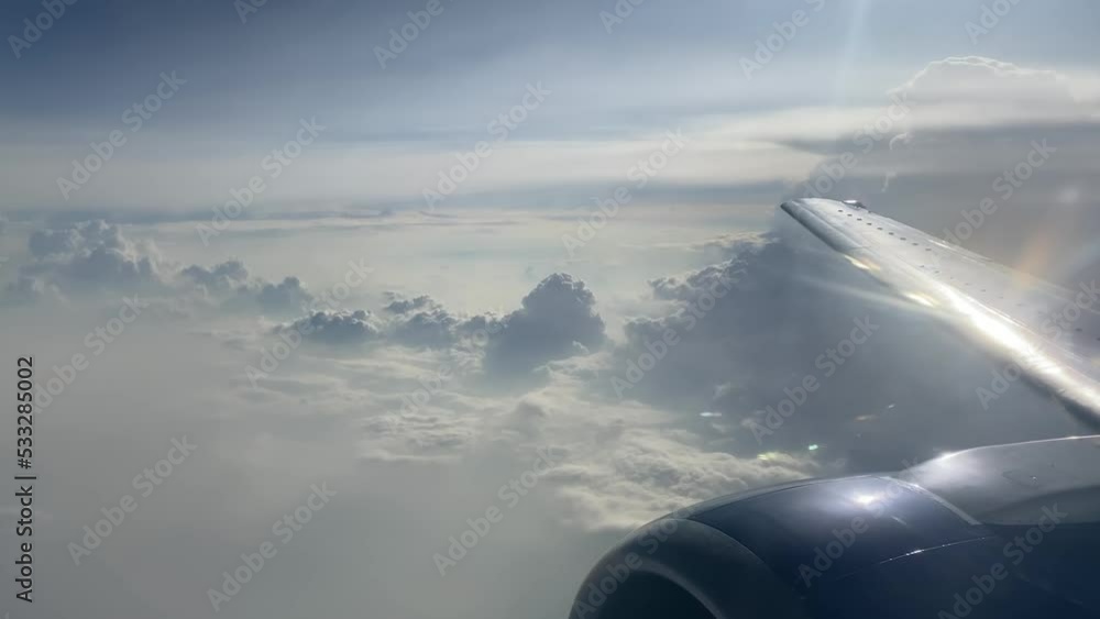 A beautiful view from the window of the aircraft on the wing, turbine ...