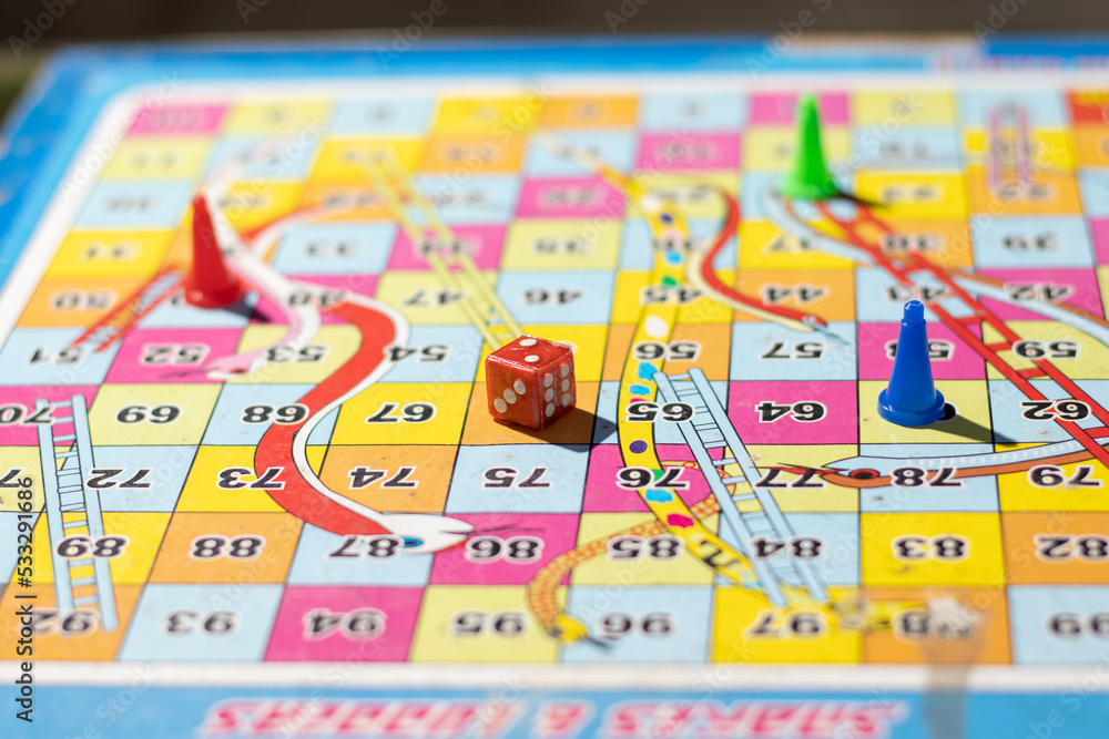 Snakes and ladders board game Stock Photo | Adobe Stock