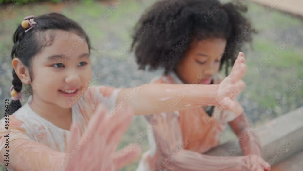 Group little asian and african american girls washing hands with soap ...
