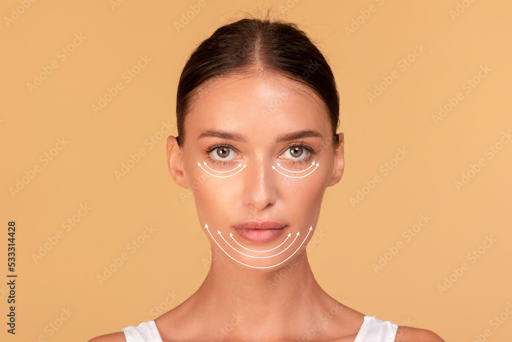 Plastic surgery woman face. Young lady with perforation lines on her ...