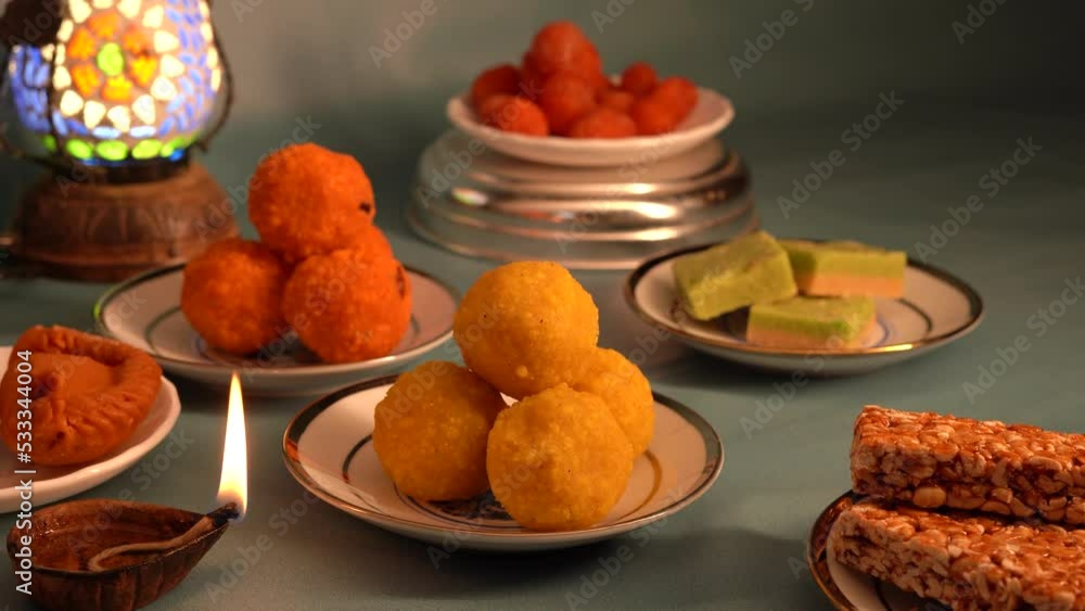 Peanut chikki candy gajak, Laddu, Indian sweet foods specially made for ...