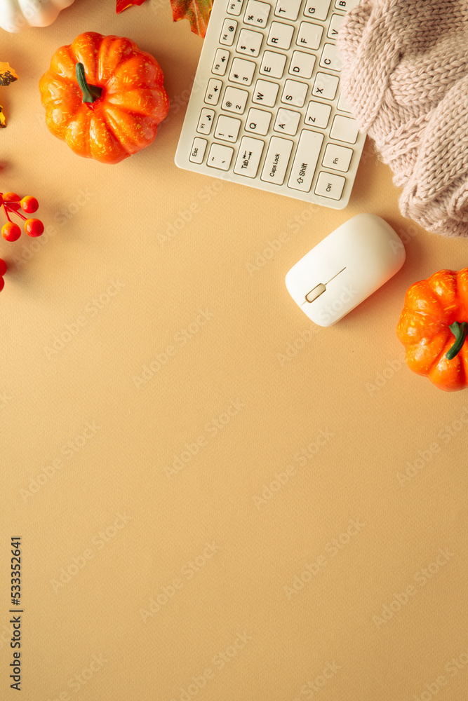 Autumn office workspace. Keyboard, laptop, notebok with autumn clothes ...