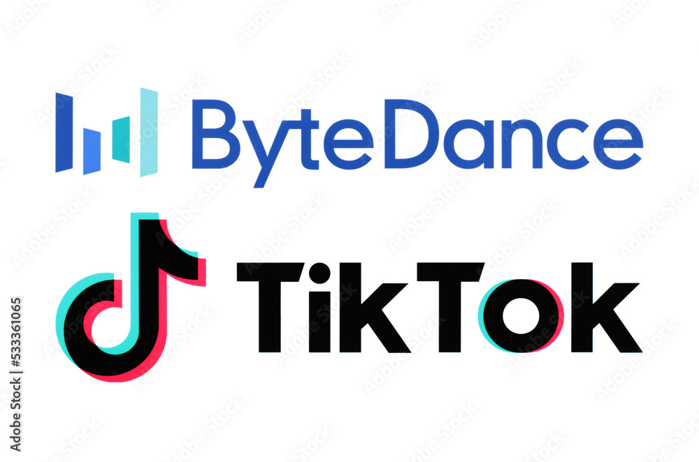 ByteDance and TikTok logos printed on white paper. TikTok is a video ...