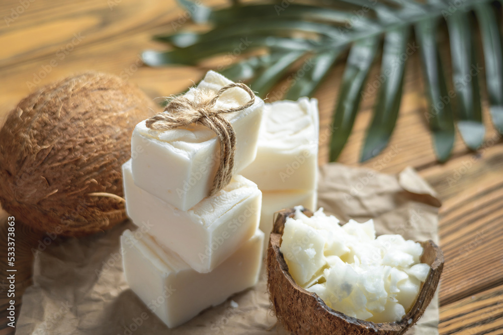 Pieces of handmade soap from organic coconut oil. Concept of using ...