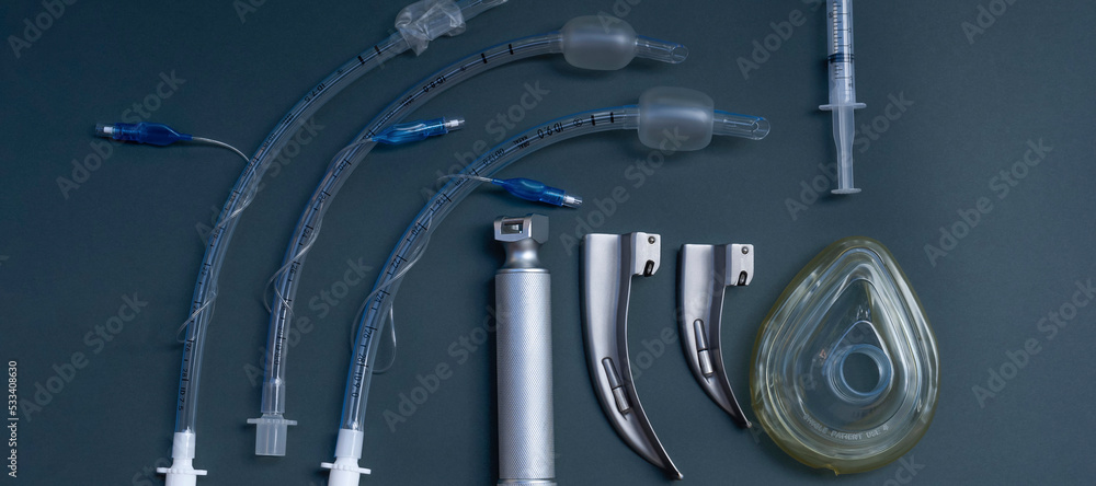 tracheal intubation kit: laryngoscope, several laryngoscope blades and ...
