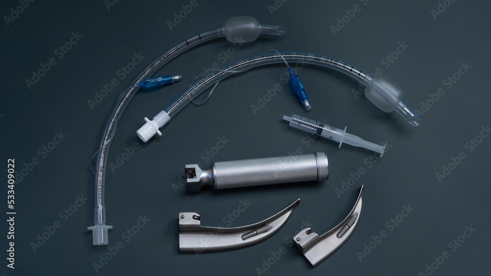 tracheal intubation kit: laryngoscope, several laryngoscope blades and ...