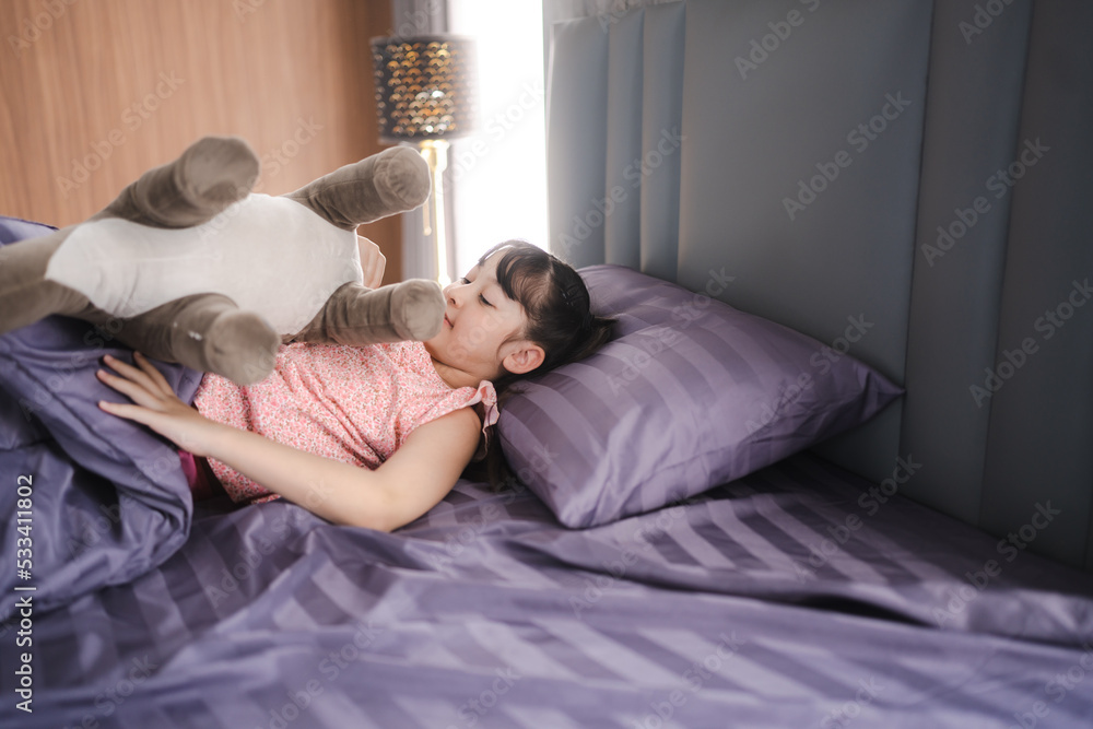 asian children girl person are sleep on bed at home, little young cute ...