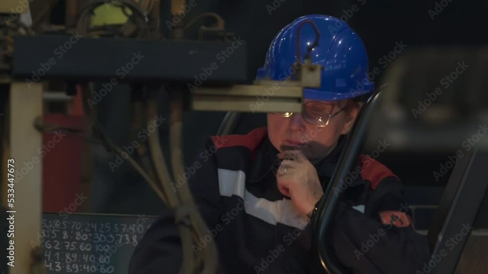 Female Engineer In Blue Safety Hard Hat Working In Industrial ...