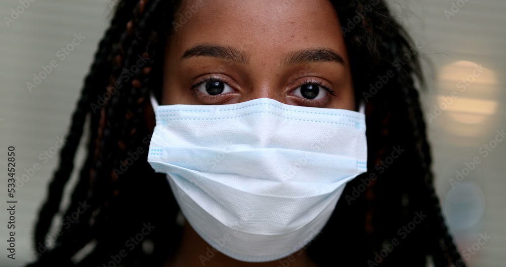 Black preteen girl putting covid-19 face mask prevention Stock Photo ... Black preteen girl putting covid-19 face mask prevention Stock Photo ...