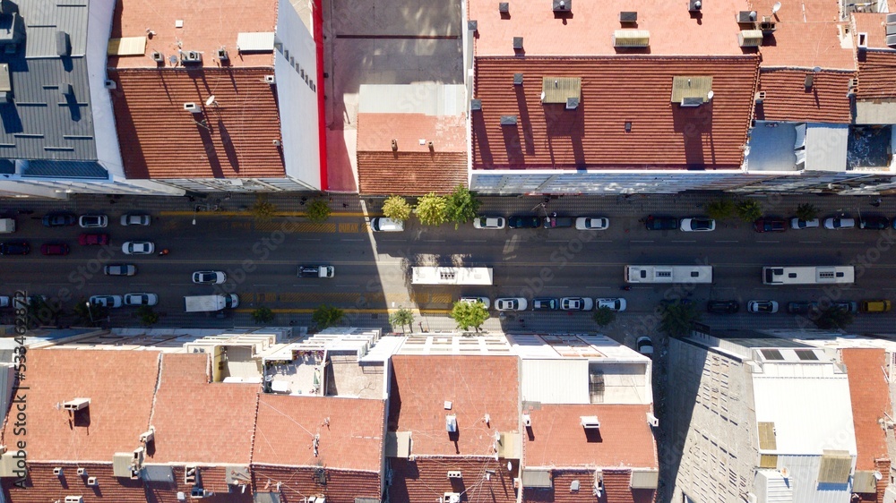 Aerial view of the road junction at the city center. Vehicles are ...