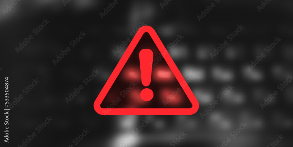 Warning Symbol with Exclamation Mark on blured background with keyboard ...