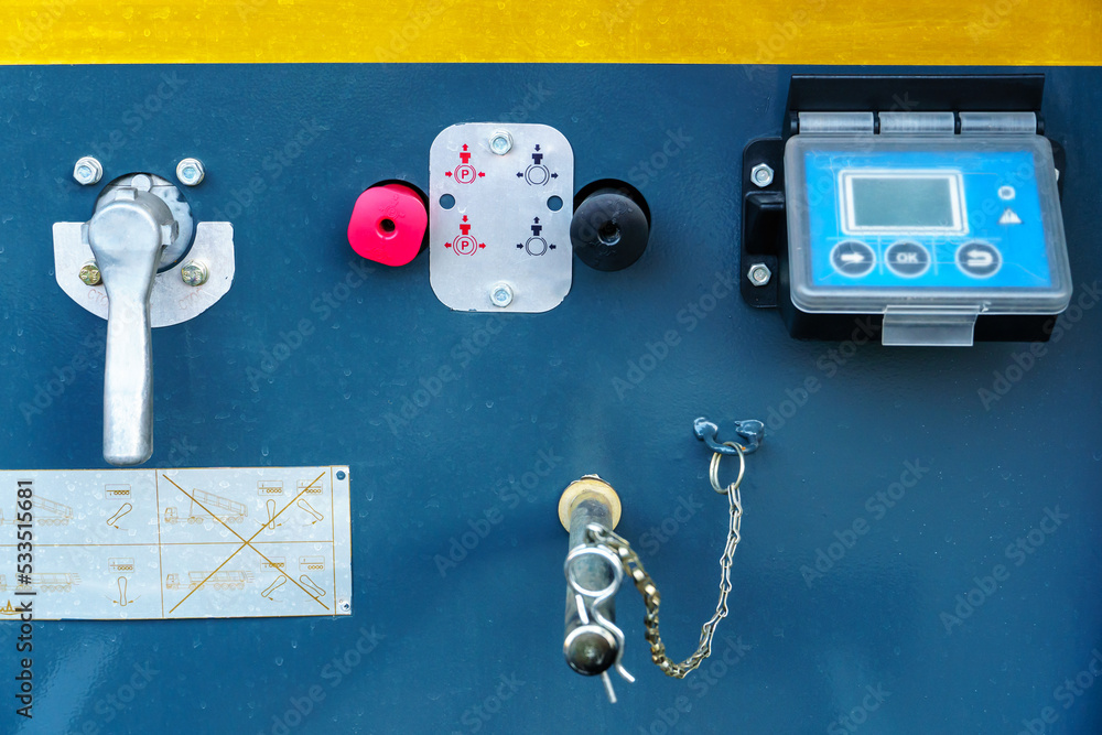 Various buttons, breakers and switches on the electronic control panel ...