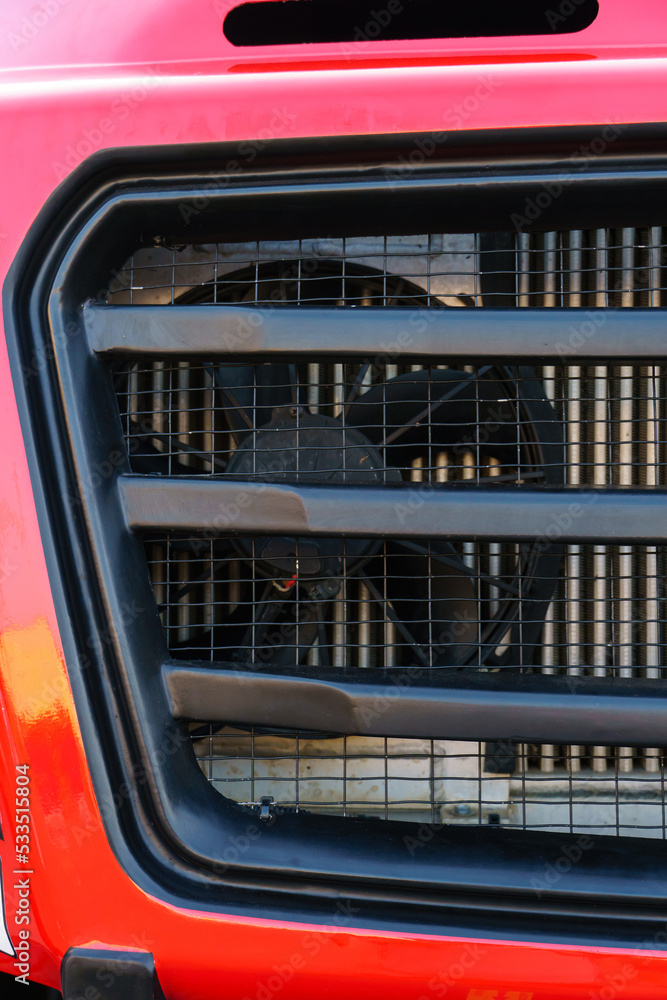 Radiator grille of a modern truck. Metal mesh to protect the cooling ...