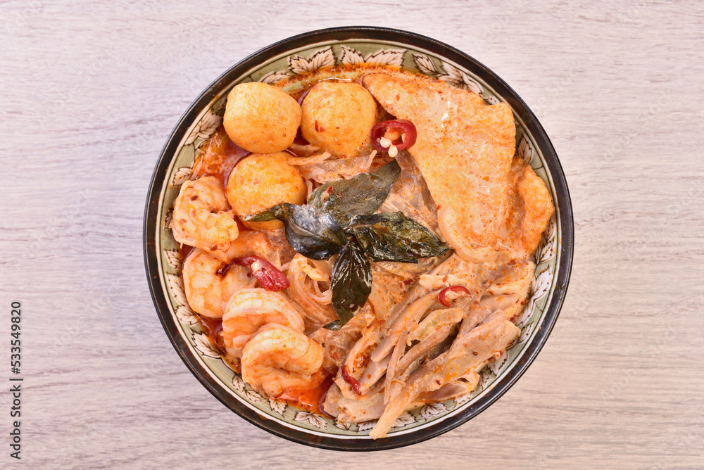 Singapore laksa - spicy noodle soup with noodles, prawns, chicken, tofu ...