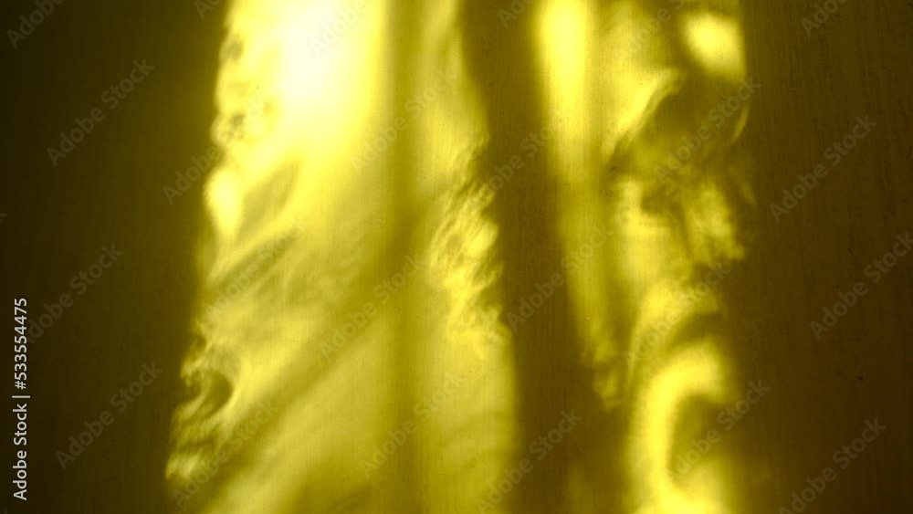 Curtain shadow motion in wind breeze through sun light reflect to ...