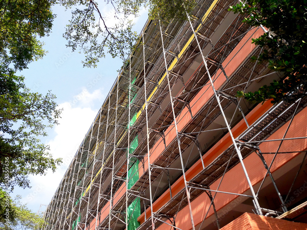 Scaffolding house. School. Building. High-rise, renovation. Scaffolding ...