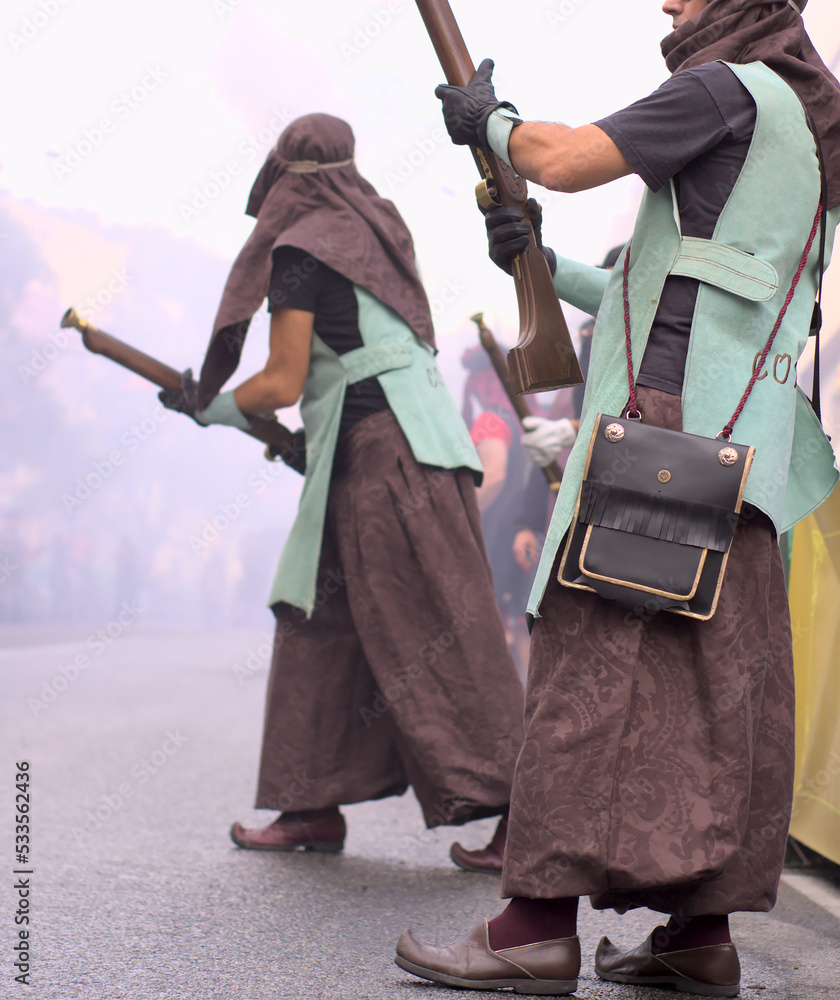 Moors and Christians fest. Two unrecognized people in arabic costume ...