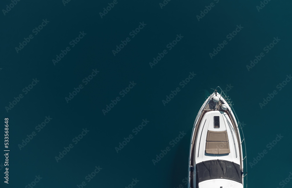 Aerial yacht on calm sea. Luxury cruise trip. View from above of white ...