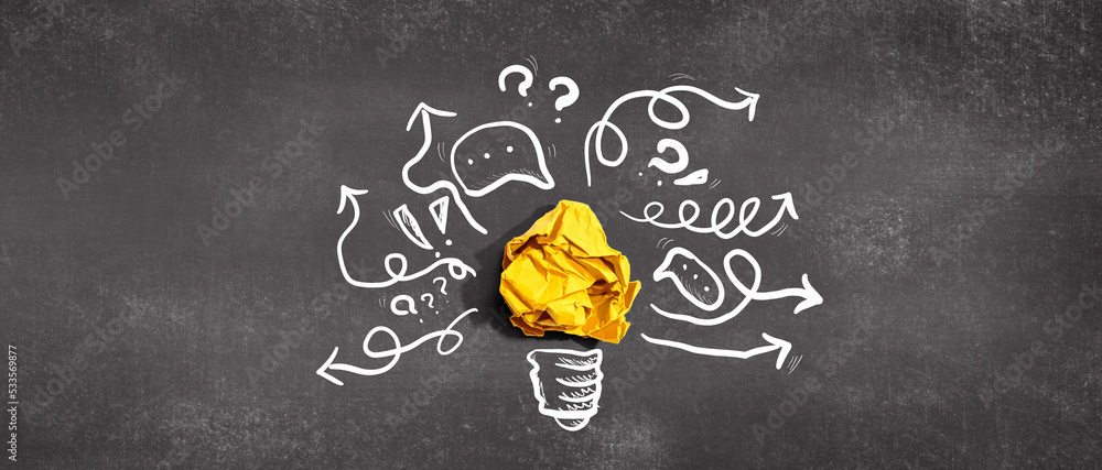 Brainstorming concept with a crumpled paper light bulb - Flat lay Stock ...