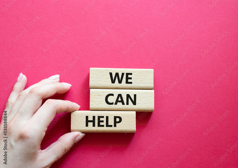 We can help symbol. Wooden blocks with words We can help. Beautiful red ...