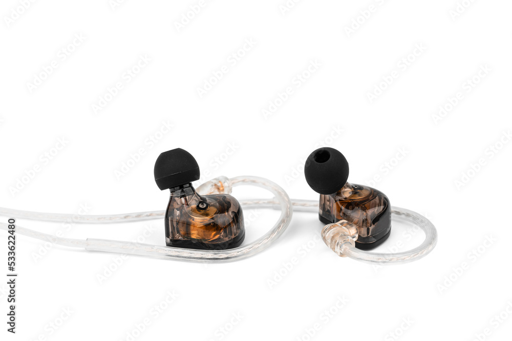 In ear monitor on a tablature background. Custom in-ear monitors with ...