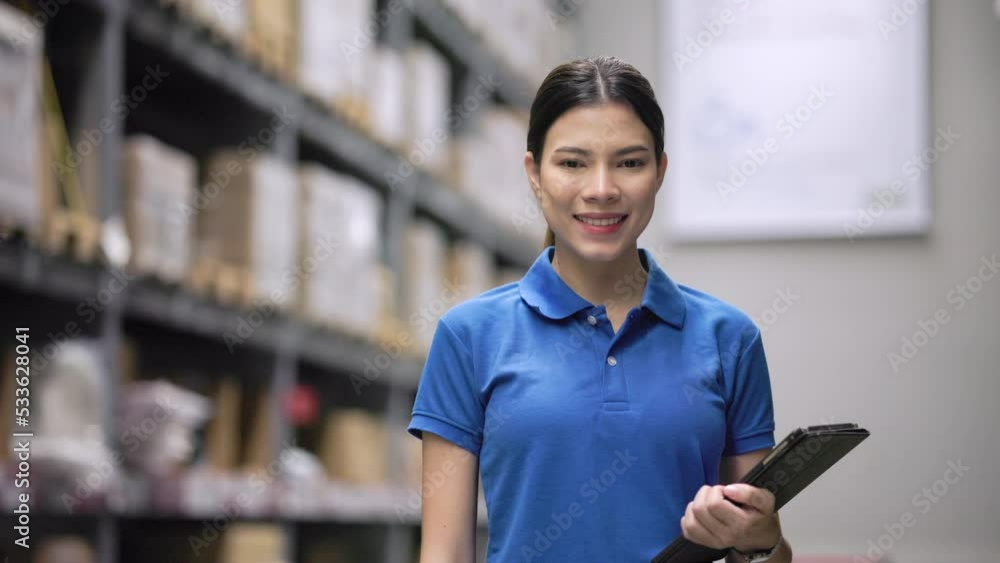 Confident woman employee holding tablet working inspection at store ...