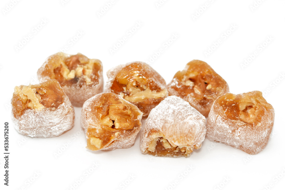 Arabian Egyptian taffy stuffed with walnuts, Eastern candy made as a ...