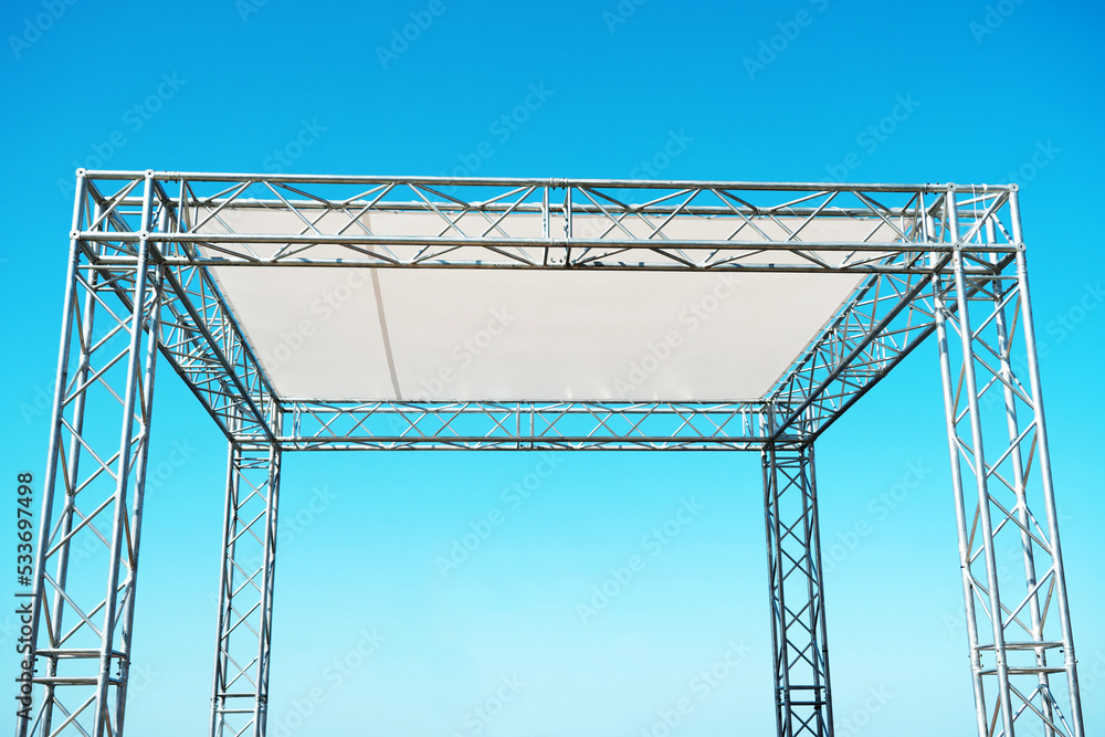 Metal structure with a woven canopy for mass events. A fragment of a ...